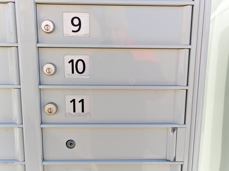 Secure community mailboxes stock photo. Image of hand - 371993322