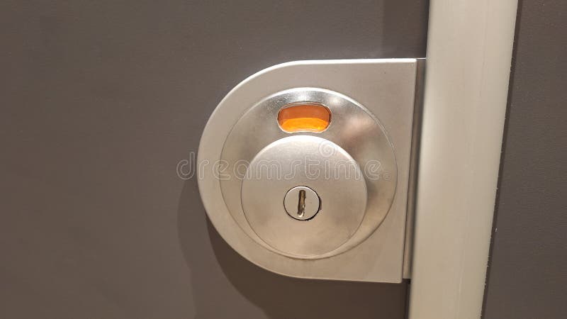 Secure Metallic Door Lock Mechanism with Keyhole on Gray Surface Stock ...