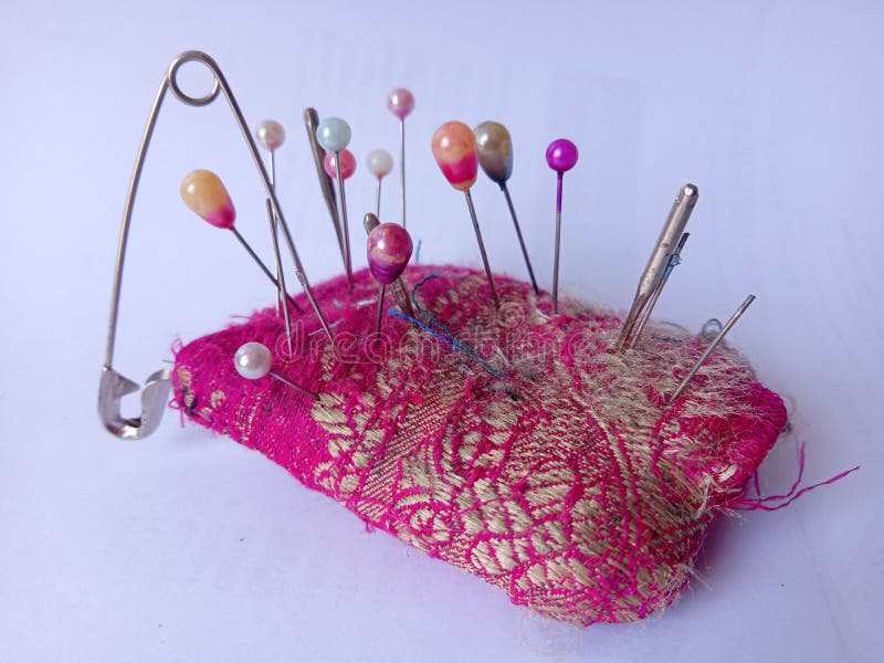 Secure Small Sharp Objects in Cloth Pads Stock Photo - Image of small ...