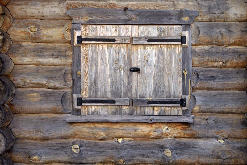 Secured log house window. stock photo. Image of simple - 37380198