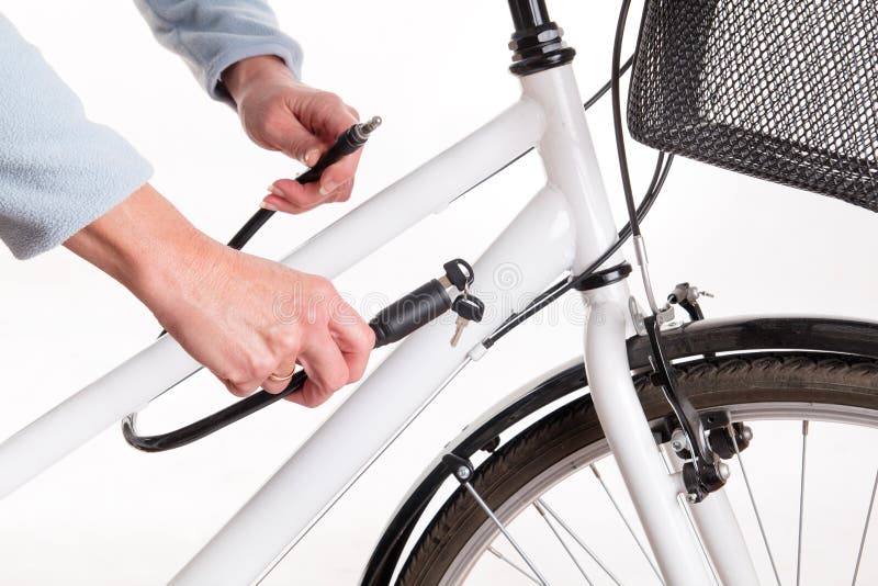 Securing the Bike with a Chain with a Key Stock Image - Image of ...