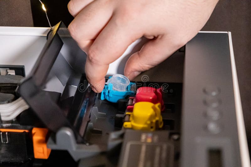 Securing Blue Ink Tank in Printer during Maintenance Process for ...