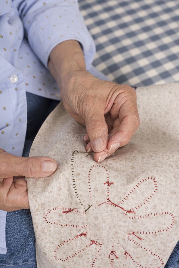 Securing the Final Stitch with a Knot Stock Photo - Image of pattern ...