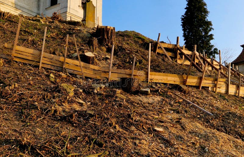Securing the Slope Against Erosion. the Repair of the Cemetery Wall is ...