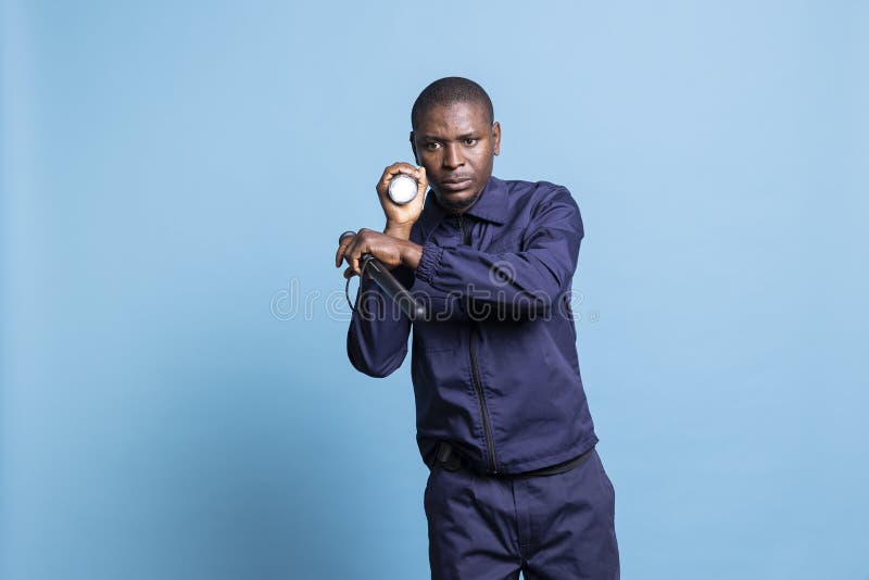 Security Agent Patrolling the Perimeter with a Lantern and Baton Stock ...