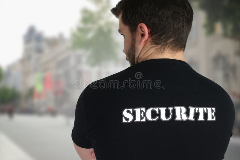 Security Agent Posing Back in a Street Stock Image - Image of ...
