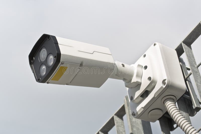 Security Camera Against a Metal Grid for the Security Control of Urban ...