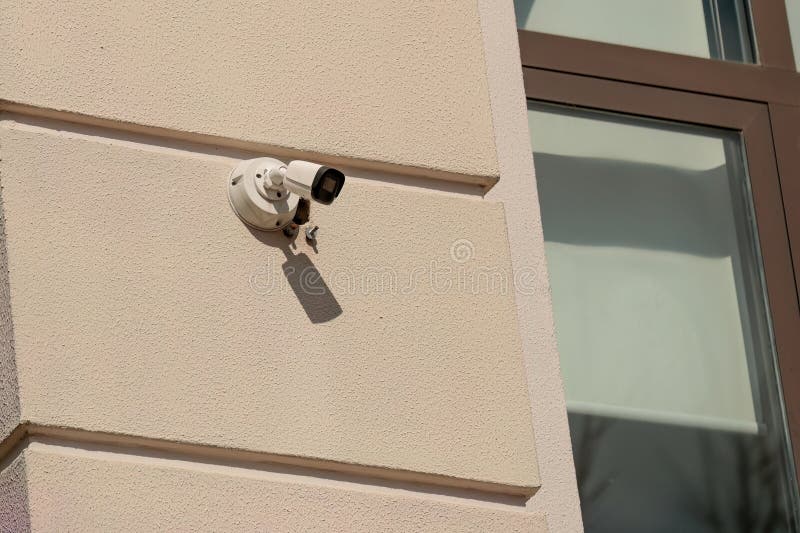 Security Camera on the Building Wall Stock Photo - Image of monitoring ...