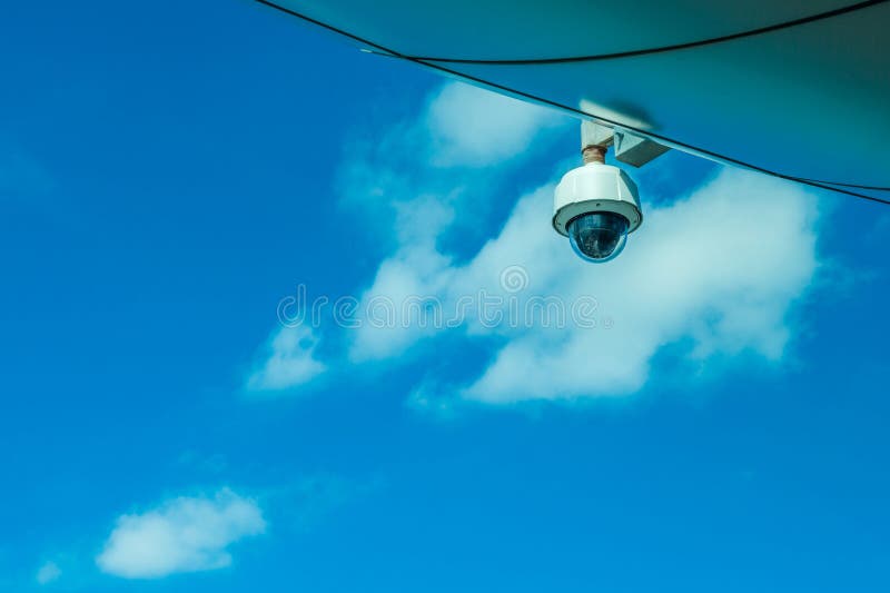 CCTV on the Blue Sky Background with Buildings in the City Stock Image ...