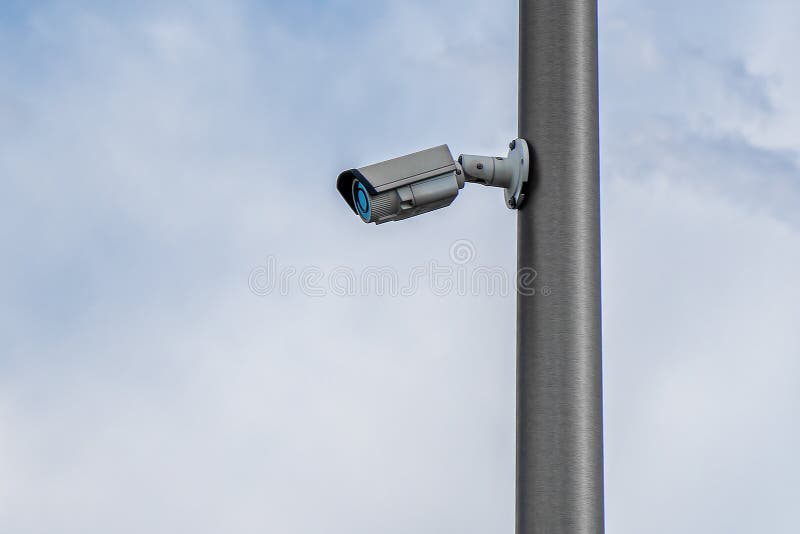 Security Camera or CCTV on Cloudy Sky Background. Stock Image - Image ...