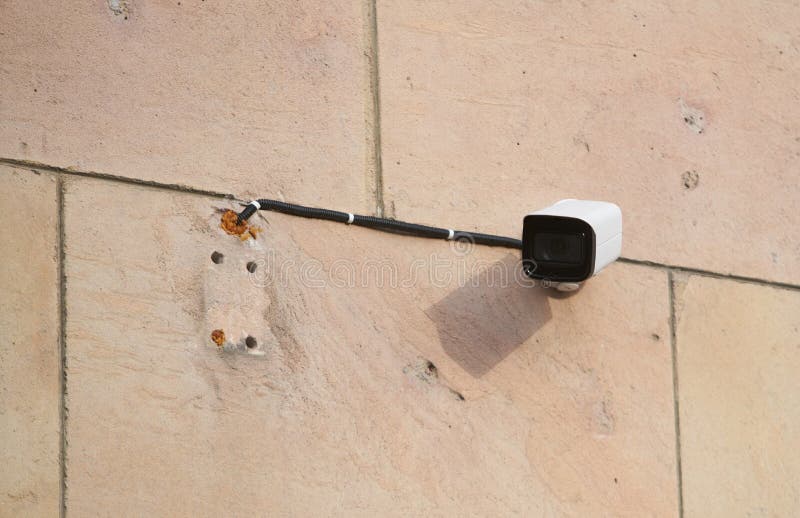 Security Camera, CCTV on Location. Security Camera on the Wall in Old ...