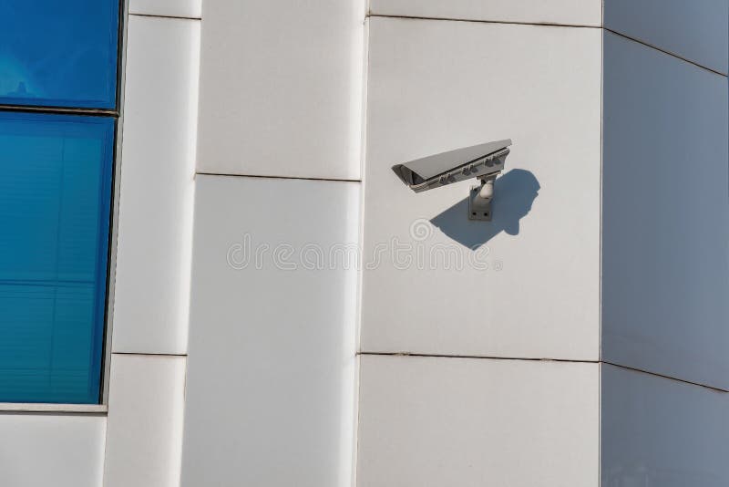 Security Camera or CCTV on a Wall Background. Stock Photo - Image of ...