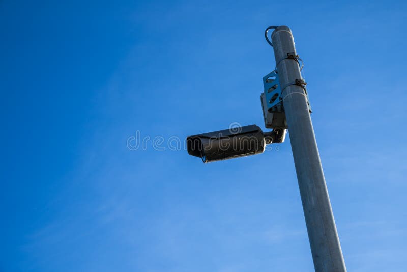 Security Camera in Front of Blue Sky Stock Image - Image of front ...