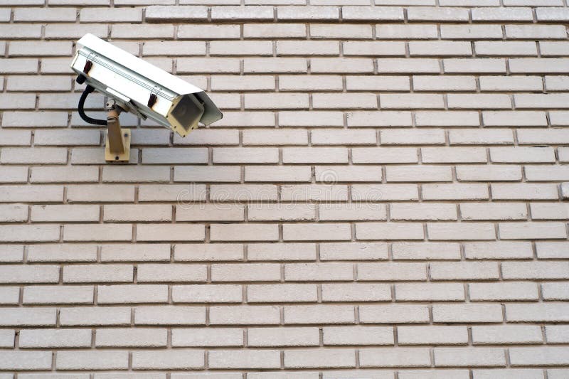 Security Camera on Gray Bricks Wall Stock Photo - Image of looking ...