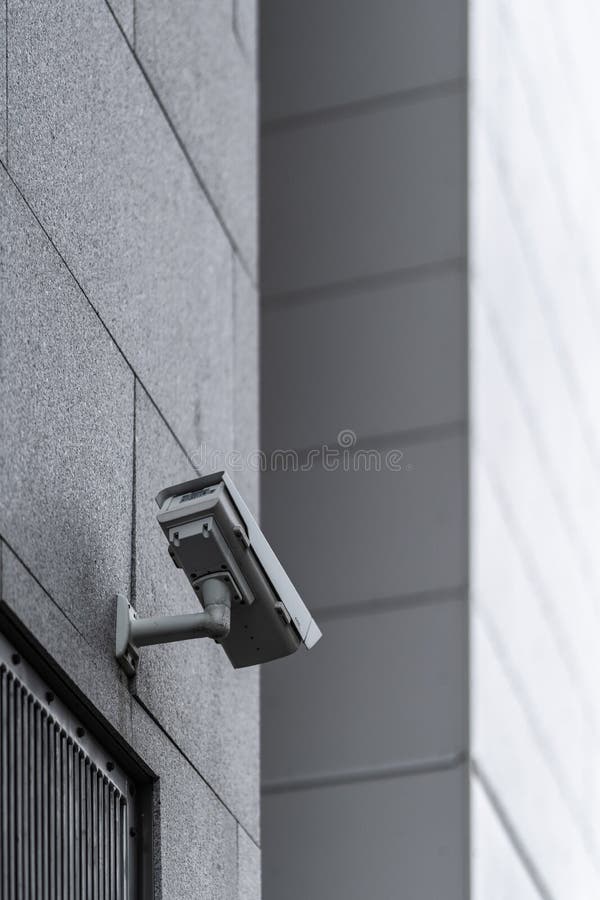 Security Camera Installed Outside on a Building Wall. Stock Photo ...