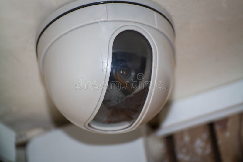 Security Camera on the Light Ceiling in Office Stock Photo - Image of ...