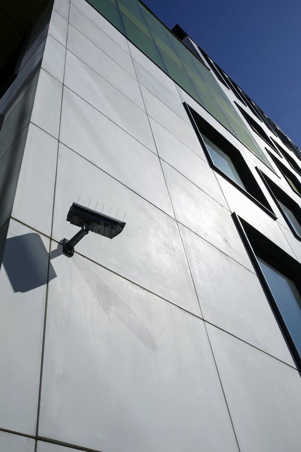 Security Camera on Modern Building with Sun Flares Stock Image - Image ...