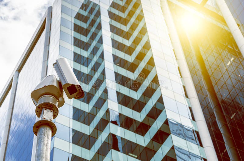 Security Camera with Modern Office Buildings in the Background Stock ...
