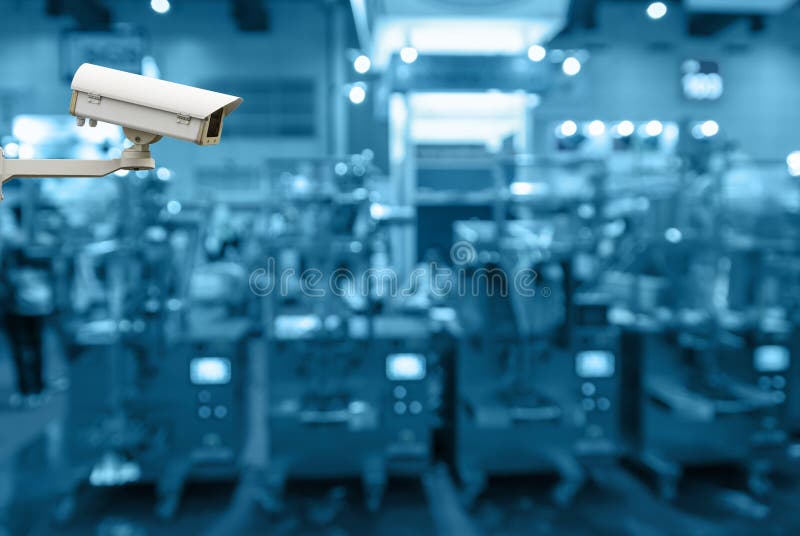 Security Camera Monitoring the Oil and Gas Refinery at Twilight Stock ...