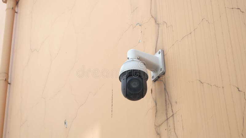 Security Camera Mounted on Cracked Wall Outdoors Stock Footage - Video ...