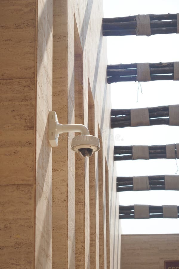 Security Camera Mounted on a Modern Building Wall in Daylight Stock ...