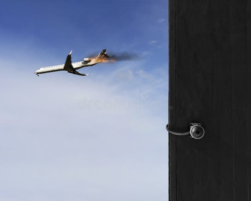 Security Camera Mounted on a Wall with a Plane Above Stock Photo ...