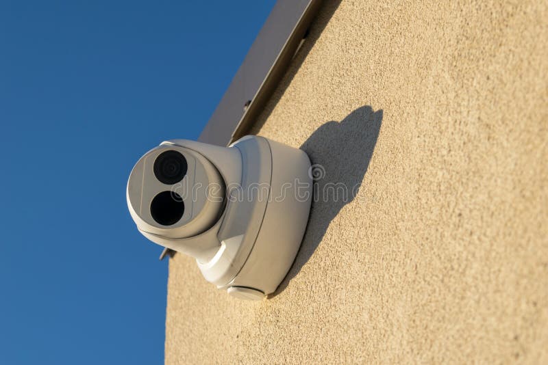 Security Camera Mounted on a Wall, Pointed Straight at the Viewer ...
