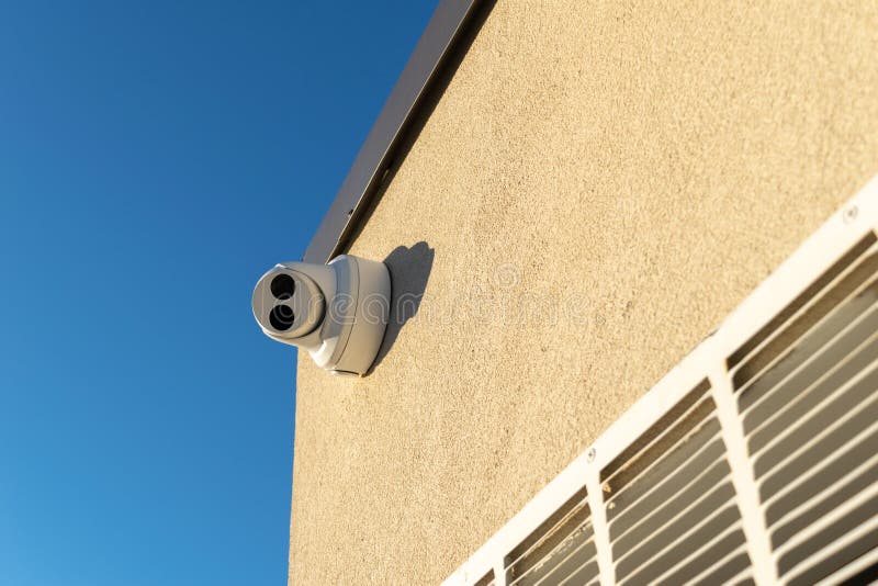 Security Camera Mounted on a Wall, Pointing Straight at the Viewer ...