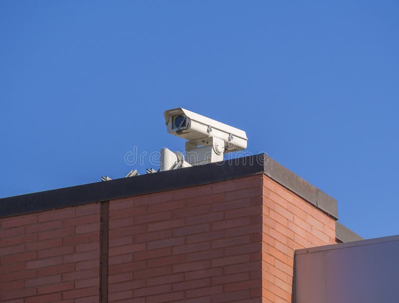 Security camera on roof stock photo. Image of cctv, home - 31062482