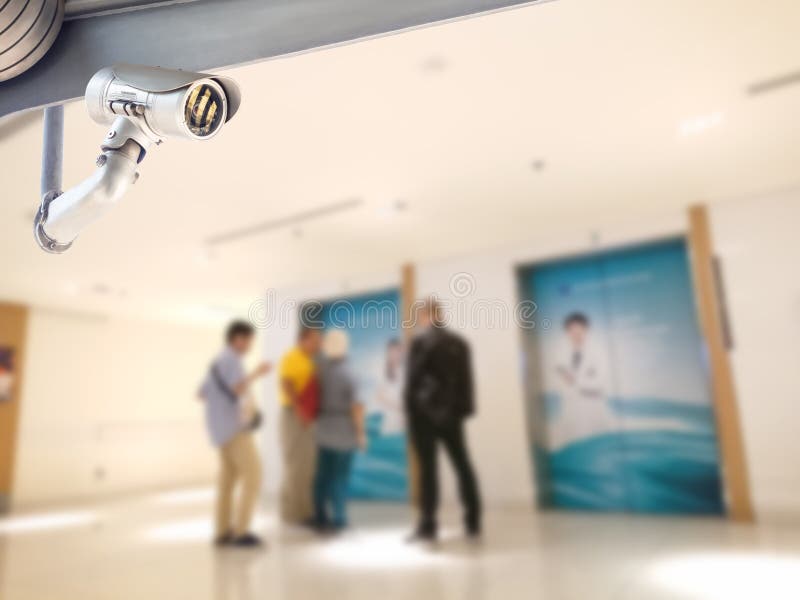 Security Camera Surveillance Installed on Ceiling To Monitor Stock ...