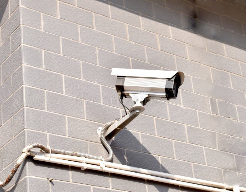 Security Camera on wall stock photo. Image of equipment - 18554518