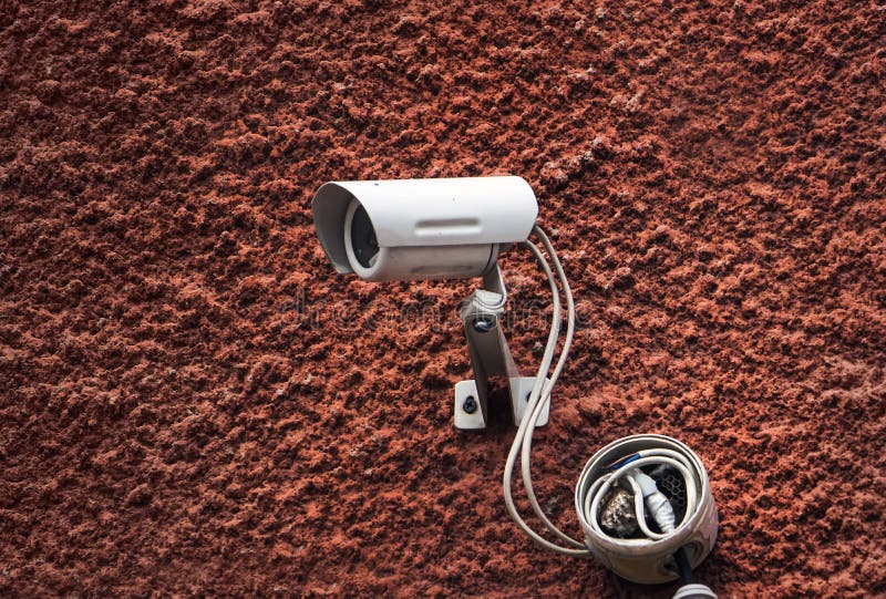Security Camera on Red Wall Stock Image - Image of outdoors, protection ...