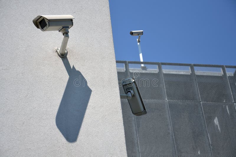 Security Cameras Over Fence Stock Image - Image of cameras, fence: 30665401