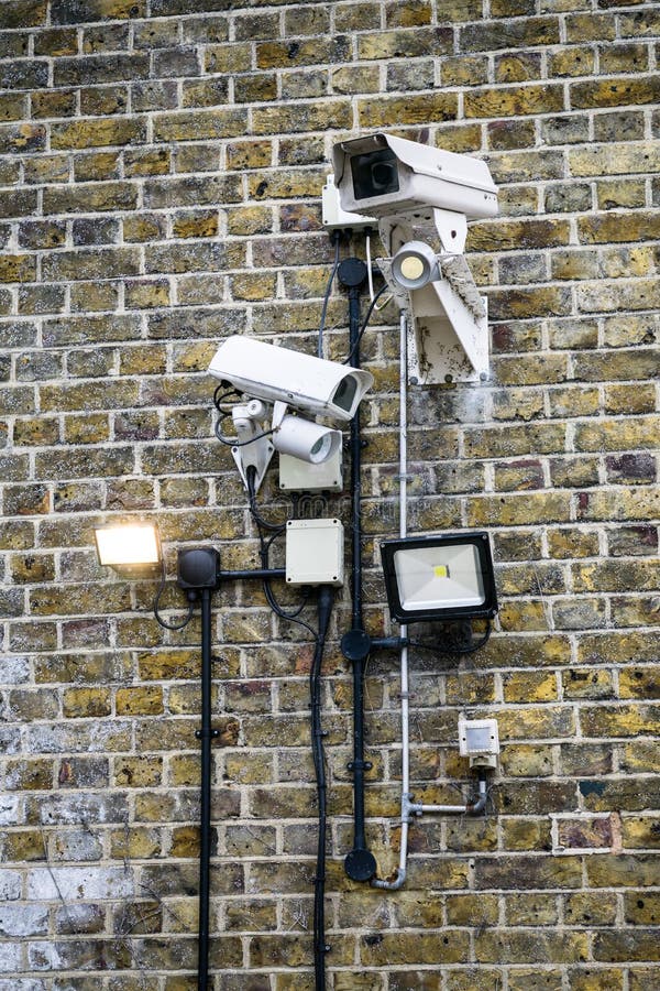 Security Cameras on Brick Wall Stock Photo - Image of cameras, security ...