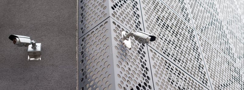 Security Cameras on Modern Building. Professional Surveillance Camera ...