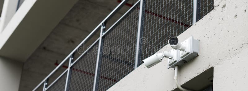 Security Cameras on Modern Building. Professional Surveillance Camera ...