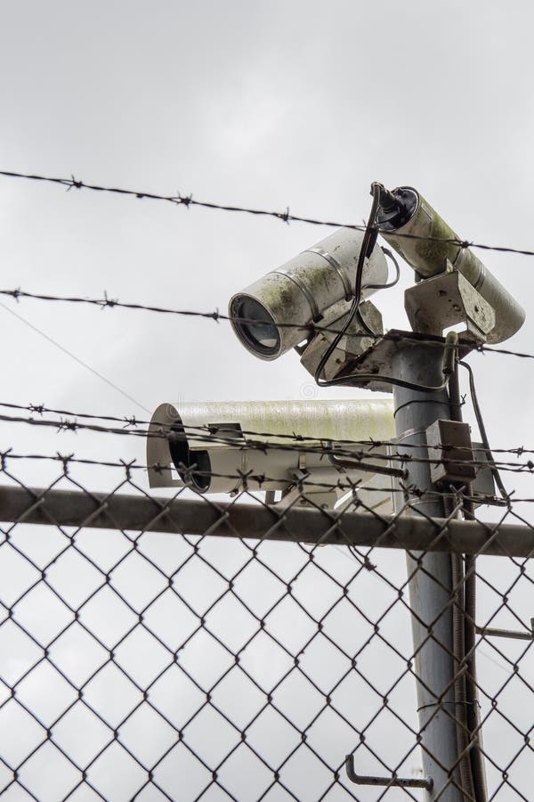 Cameras on Top of Security Fence Stock Photo - Image of protection ...