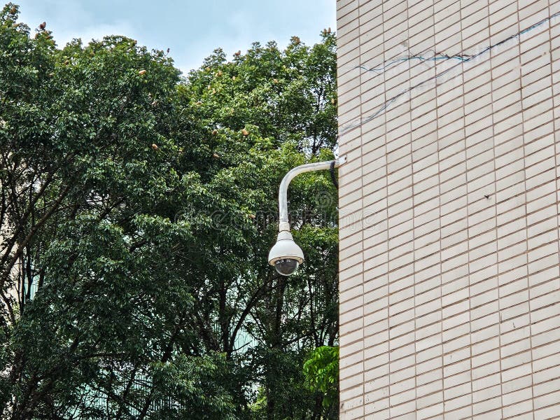 Security Cameras on Pole with Building in Background Stock Photo ...