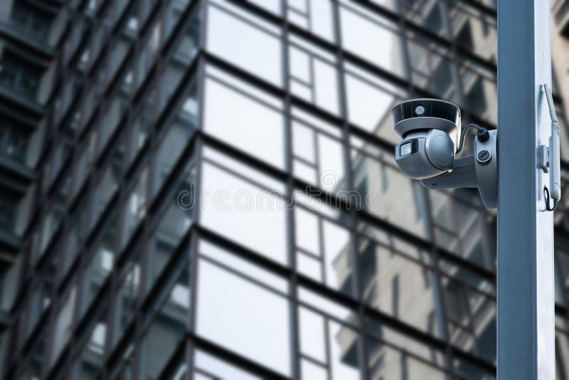 Security CCTV Camera in Office Building. Blurred Background. Stock ...
