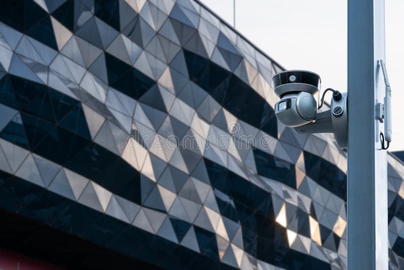 Security CCTV Camera in Office Building. Blurred Background. Stock ...