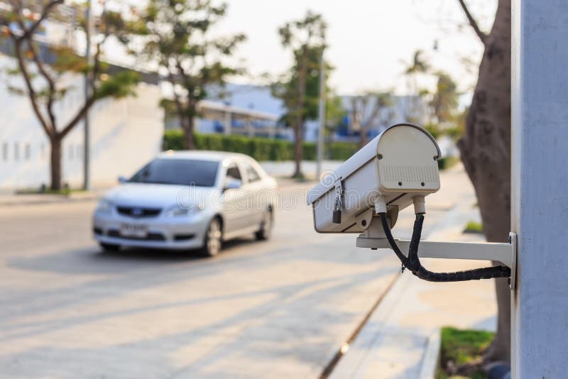Security CCTV Camera Operating Over the Road Stock Image - Image of ...