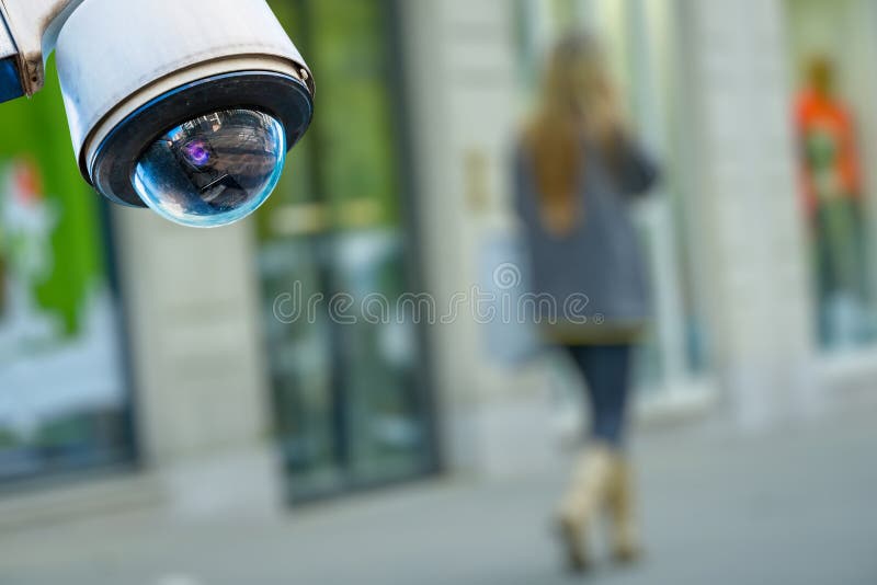 Security CCTV Camera or Surveillance System with a Pedestrian on Blurry ...