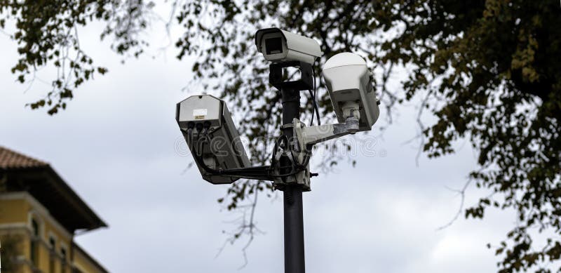 Security CCTV Cameras on a Lamp Post in the Park Stock Image - Image of ...