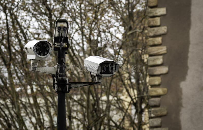 Security CCTV Cameras on a Lamp Post in the Park Stock Photo - Image of ...