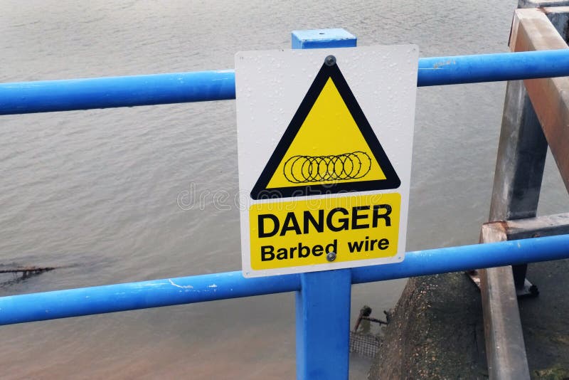 Security Danger Sign for Barbed Wire. Stock Photo - Image of safety ...