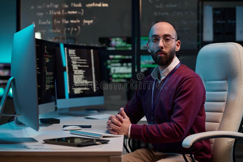 It Security Engineer Looking at Camera in Blue Light Stock Image ...