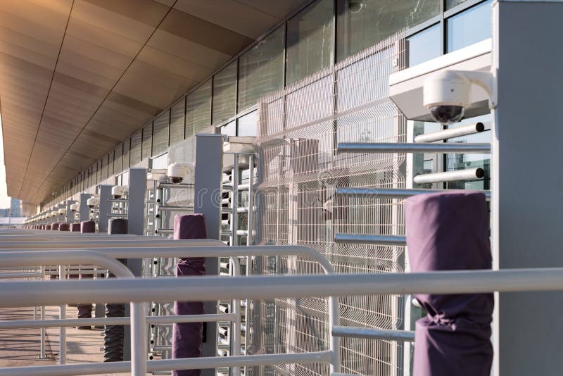 Security Entrance Gate - Secured Turnstiles before Inspection at ...