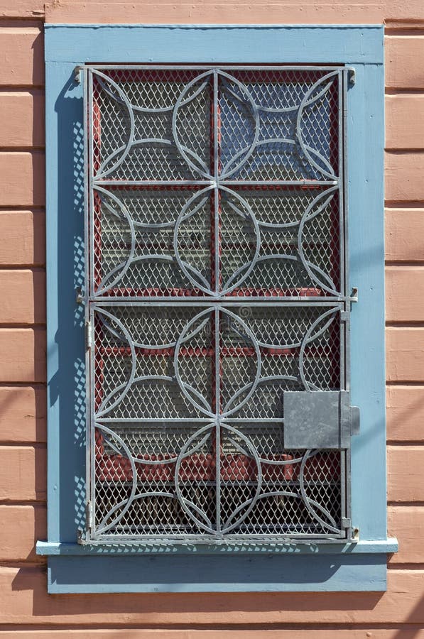 Security Grate Mounted Over Window Stock Photo - Image of clapboard ...