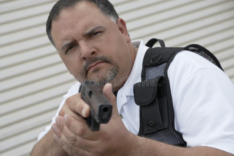 Security Guard in Bulletproof Vest Holding Gun Stock Image - Image of ...
