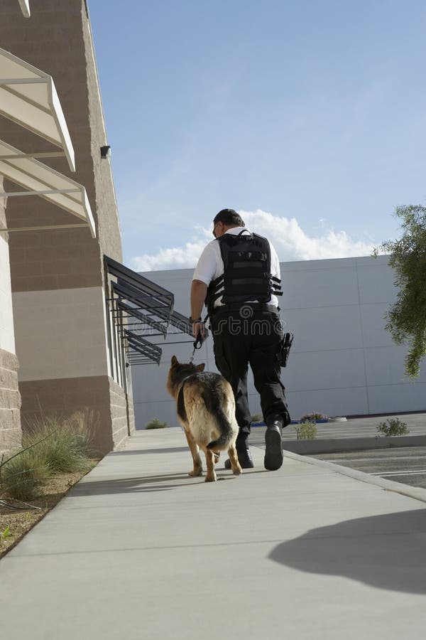Security Guard with Dog stock photo. Image of partnership - 29659758
